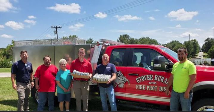 Stover Rural FD Receives NVFC and A-B Donation of Water – News/ Talk KRMS
